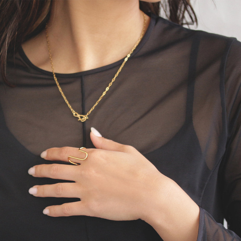 Gold Tone Surgical Steel Swoop Ring